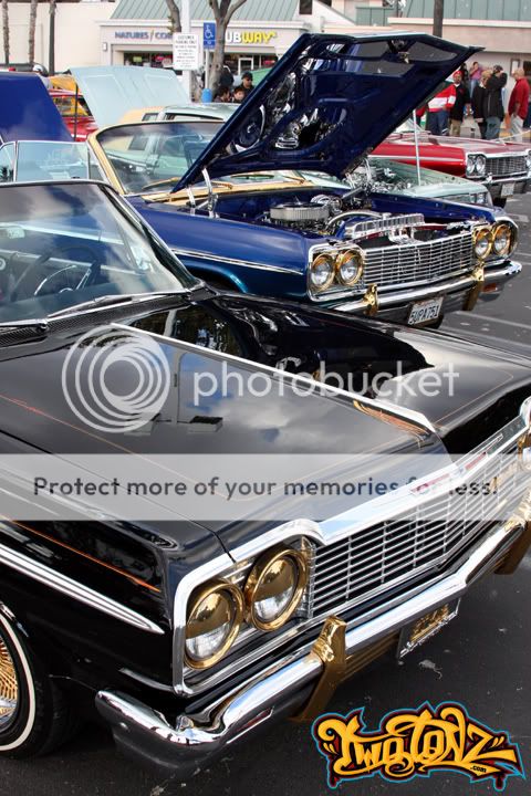 64 impala with gold trim | LayItLow.com Lowrider Forums